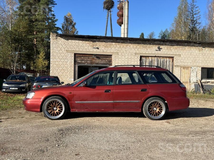 Sarkans Subaru Legacy 2000 Balvi, ar dzinēja tilpumu 2.00 L un nobraukumu 270 tūkst. km par 2000 €, foto 1 vietnē AUTOMOTO.COM.LV