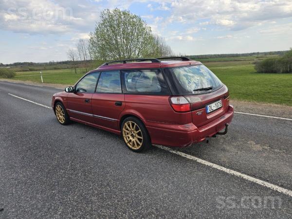 Red Subaru Legacy 2000 in Preili, with an engine capacity of 2.00 L and mileage of 277 thousand km for 2900 €, photo 4 on AUTOMOTO.COM.LV