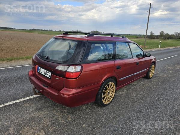 Red Subaru Legacy 2000 in Preili, with an engine capacity of 2.00 L and mileage of 277 thousand km for 2900 €, photo 5 on AUTOMOTO.COM.LV