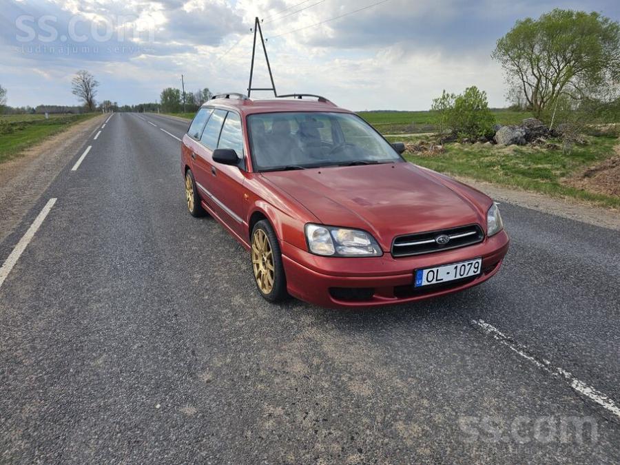 Red Subaru Legacy 2000 in Preili, with an engine capacity of 2.00 L and mileage of 277 thousand km for 2900 €, photo 3 on AUTOMOTO.COM.LV