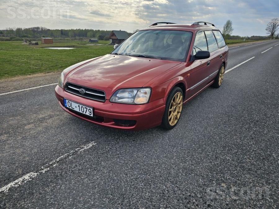 Red Subaru Legacy 2000 in Preili, with an engine capacity of 2.00 L and mileage of 277 thousand km for 2900 €, photo 4 on AUTOMOTO.COM.LV