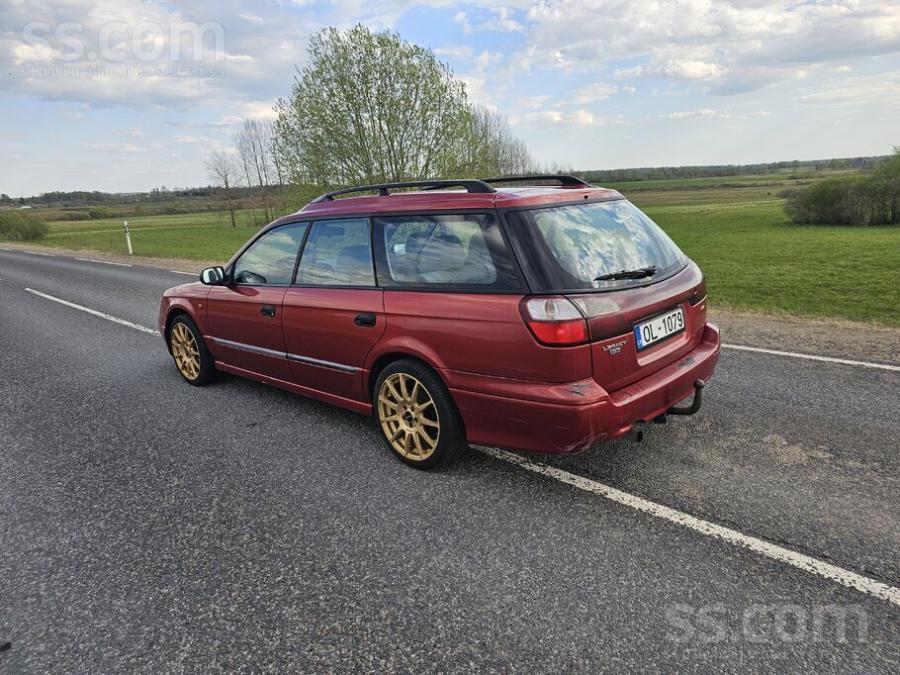 Red Subaru Legacy 2000 in Preili, with an engine capacity of 2.00 L and mileage of 277 thousand km for 2900 €, photo 5 on AUTOMOTO.COM.LV