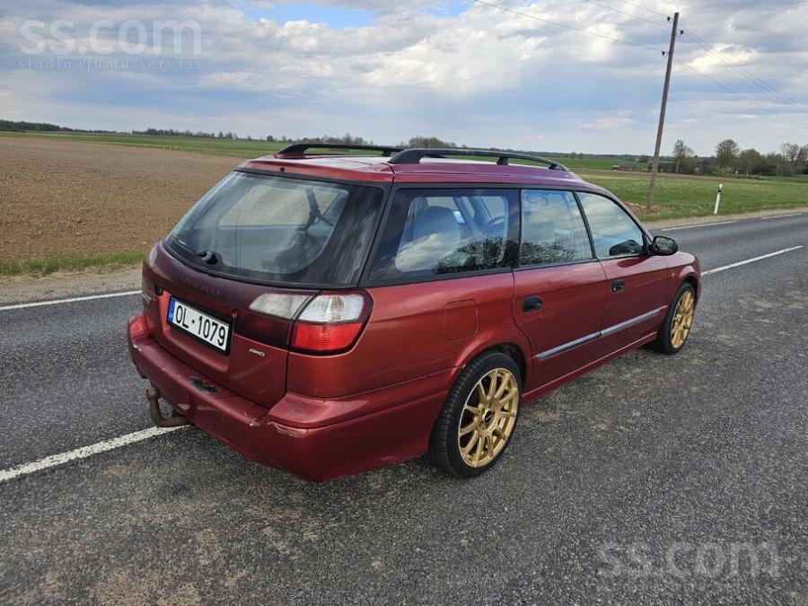 Red Subaru Legacy 2000 in Preili, with an engine capacity of 2.00 L and mileage of 277 thousand km for 2900 €, photo 6 on AUTOMOTO.COM.LV