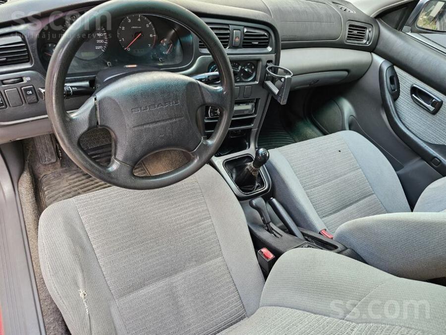 Red Subaru Legacy 2000 in Preili, with an engine capacity of 2.00 L and mileage of 277 thousand km for 2900 €, photo 7 on AUTOMOTO.COM.LV