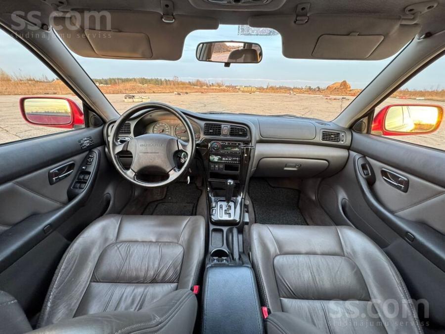 Red Subaru Legacy 2001 in Riga, with an engine capacity of 2.50 L and mileage of 0 thousand km for 1599 €, photo 11 on AUTOMOTO.COM.LV