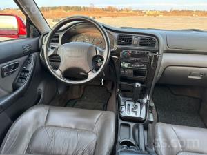 Red Subaru Legacy 2001 in Riga, with an engine capacity of 2.50 L and mileage of 0 thousand km for 1599 €, photo 12 on AUTOMOTO.COM.LV