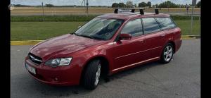 Sarkans Subaru Legacy 2004 Joniškis, ar dzinēja tilpumu 2.46 L un nobraukumu 313 tūkst. km par 1999 €, foto  vietnē AUTOMOTO.COM.LV