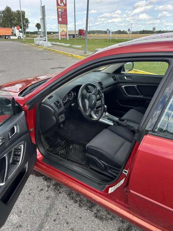 Red Subaru Legacy 2004 in Joniskis, with an engine capacity of 2.46 L and mileage of 313 thousand km for 1999 €, photo 9 on AUTOMOTO.COM.LV
