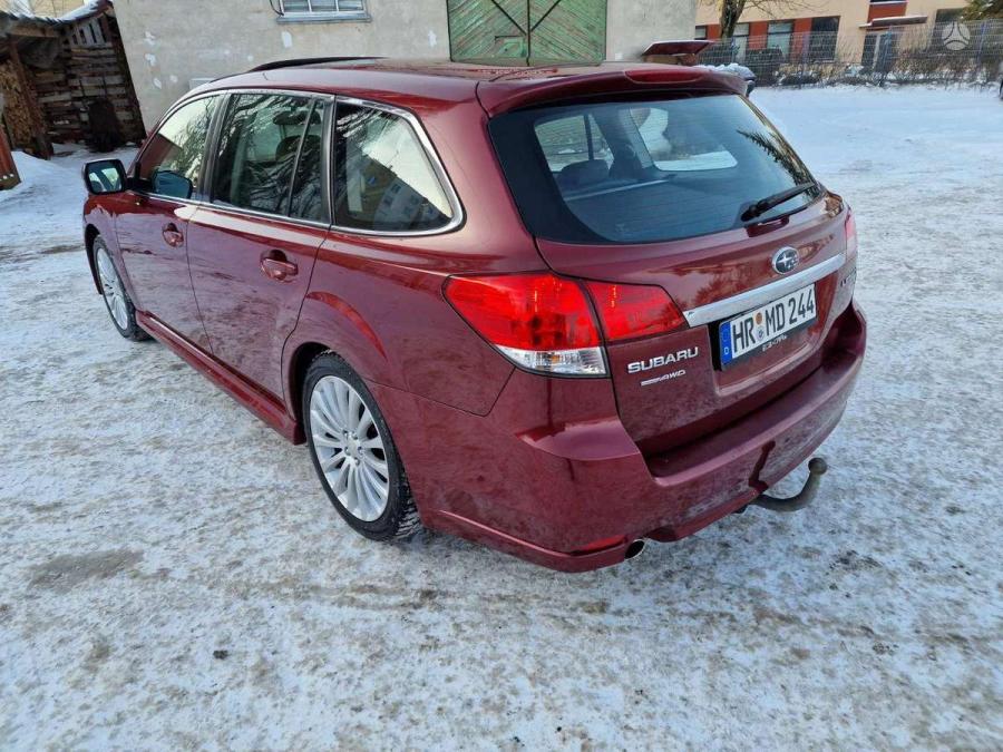 Red Subaru Legacy 2011 in Panevezys, with an engine capacity of 2.50 L and mileage of 185 thousand km for 5299 €, photo 4 on AUTOMOTO.COM.LV