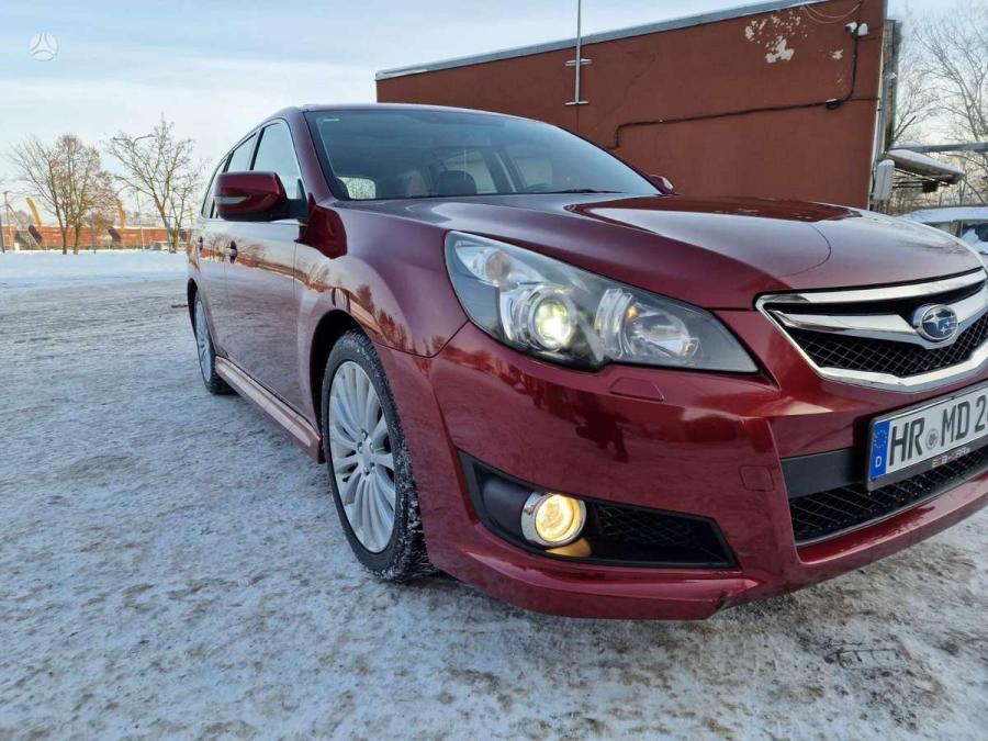 Red Subaru Legacy 2011 in Panevezys, with an engine capacity of 2.50 L and mileage of 185 thousand km for 5299 €, photo 7 on AUTOMOTO.COM.LV