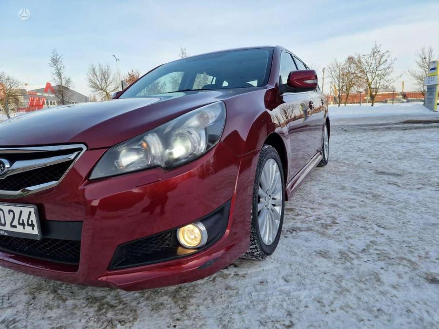 Red Subaru Legacy 2011 in Panevezys, with an engine capacity of 2.50 L and mileage of 185 thousand km for 5299 €, photo 12 on AUTOMOTO.COM.LV
