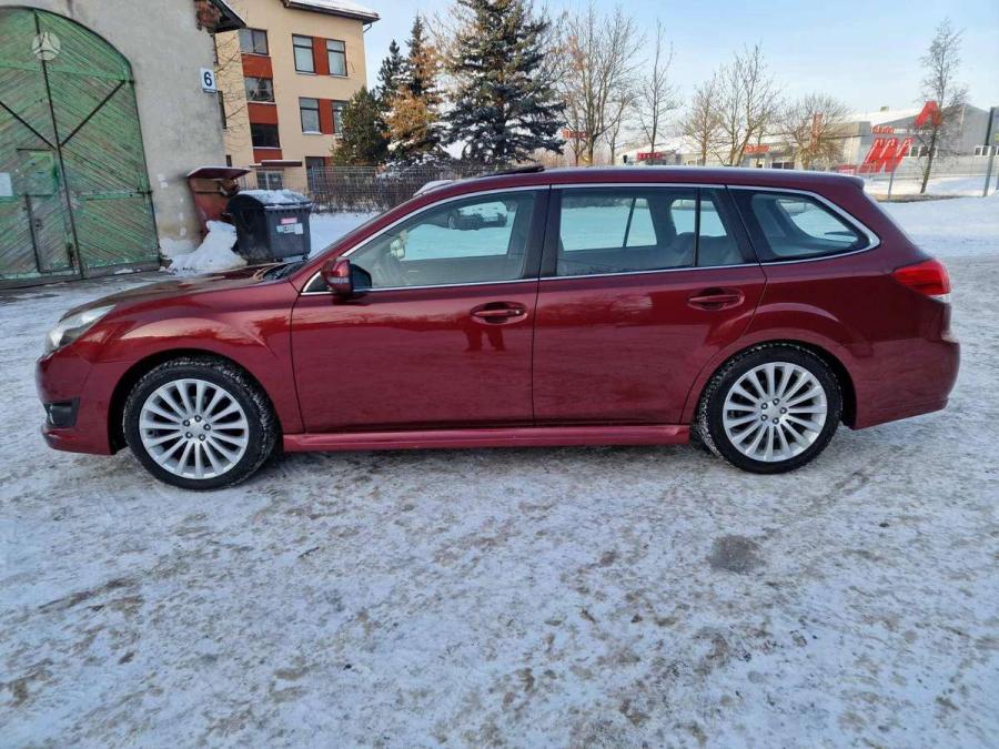 Red Subaru Legacy 2011 in Panevezys, with an engine capacity of 2.50 L and mileage of 185 thousand km for 5299 €, photo 14 on AUTOMOTO.COM.LV