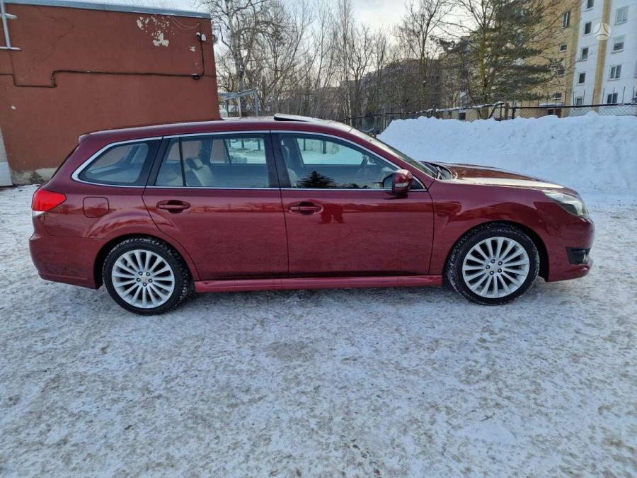 Red Subaru Legacy 2011 in Panevezys, with an engine capacity of 2.50 L and mileage of 185 thousand km for 5299 €, photo 15 on AUTOMOTO.COM.LV