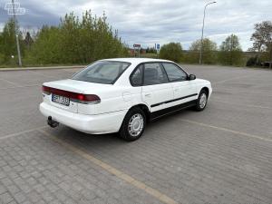 White Subaru Legacy 1995 in Anyksciai, with an engine capacity of 2.00 L and mileage of 211 thousand km for 750 €, photo 6 on AUTOMOTO.COM.LV