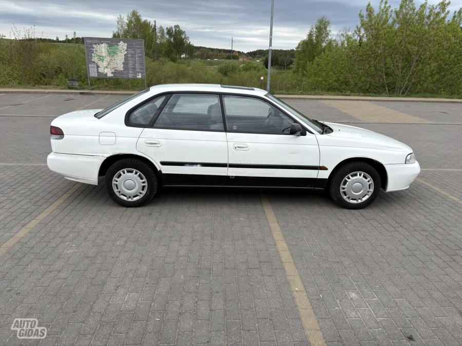 White Subaru Legacy 1995 in Anyksciai, with an engine capacity of 2.00 L and mileage of 211 thousand km for 750 €, photo 7 on AUTOMOTO.COM.LV