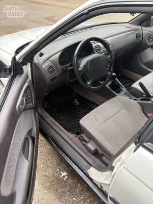 White Subaru Legacy 1995 in Anyksciai, with an engine capacity of 2.00 L and mileage of 211 thousand km for 750 €, photo 10 on AUTOMOTO.COM.LV
