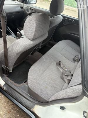White Subaru Legacy 1995 in Anyksciai, with an engine capacity of 2.00 L and mileage of 211 thousand km for 750 €, photo 11 on AUTOMOTO.COM.LV