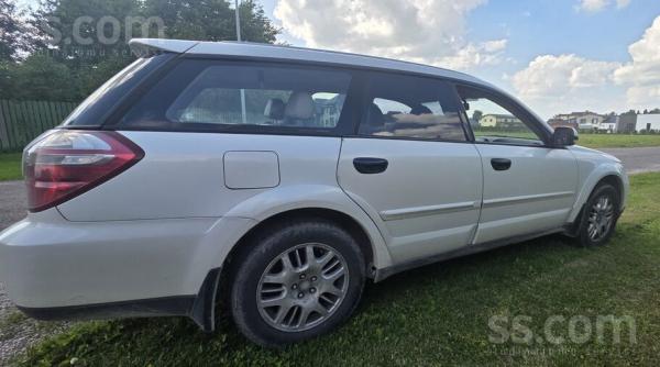 White Subaru Legacy 2004 in Riga, with an engine capacity of 2.50 L and mileage of 238 thousand km for 1500 €, photo 2 on AUTOMOTO.COM.LV