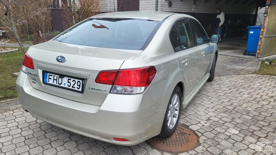 Yellow Subaru Legacy 2011 in Druskininkai, with an engine capacity of 2.00 L and mileage of 263 thousand km for 5499 €, photo 4 on AUTOMOTO.COM.LV