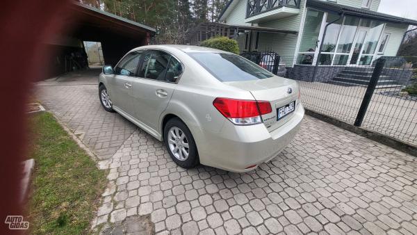 Yellow Subaru Legacy 2011 in Druskininkai, with an engine capacity of 2.00 L and mileage of 263 thousand km for 5499 €, photo 4 on AUTOMOTO.COM.LV