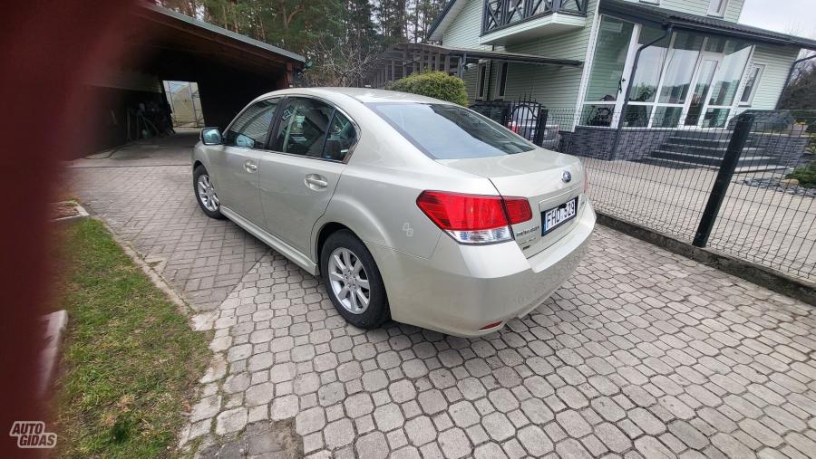 Yellow Subaru Legacy 2011 in Druskininkai, with an engine capacity of 2.00 L and mileage of 263 thousand km for 5499 €, photo 5 on AUTOMOTO.COM.LV