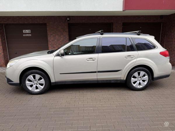 Yellow Subaru Legacy 2012 in Vilnius, with an engine capacity of 2.00 L and mileage of 300 thousand km for 2200 €, photo 5 on AUTOMOTO.COM.LV