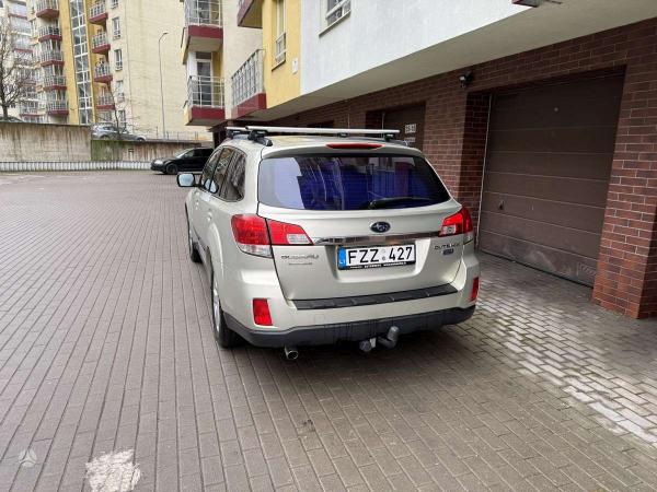 Yellow Subaru Legacy 2012 in Vilnius, with an engine capacity of 2.00 L and mileage of 300 thousand km for 2200 €, photo 7 on AUTOMOTO.COM.LV
