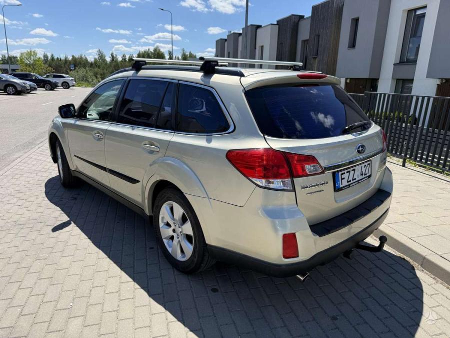 Yellow Subaru Legacy 2012 in Vilnius, with an engine capacity of 2.00 L and mileage of 300 thousand km for 1700 €, photo 5 on AUTOMOTO.COM.LV