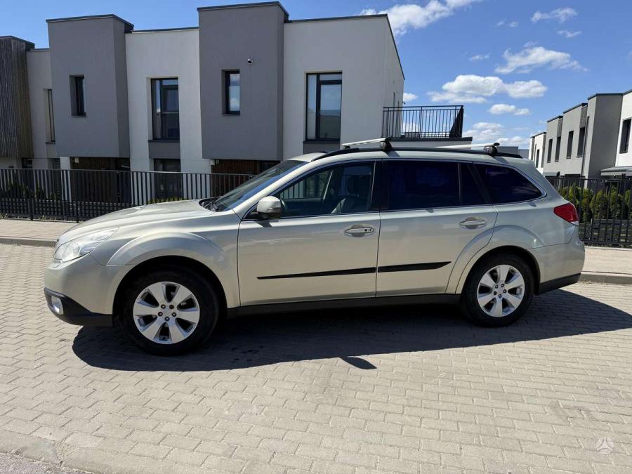 Yellow Subaru Legacy 2012 in Vilnius, with an engine capacity of 2.00 L and mileage of 300 thousand km for 1700 €, photo 7 on AUTOMOTO.COM.LV