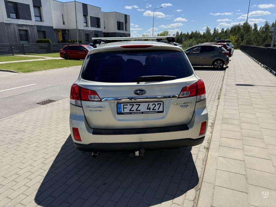 Yellow Subaru Legacy 2012 in Vilnius, with an engine capacity of 2.00 L and mileage of 300 thousand km for 1700 €, photo 8 on AUTOMOTO.COM.LV