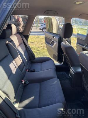 Black Subaru Outback 2009 in Riga, with an engine capacity of 2.00 L and mileage of 288 thousand km for 2500 €, photo 11 on AUTOMOTO.COM.LV