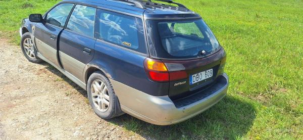 Blue Subaru Outback 2000 in Kaunas, with an engine capacity of 2.50 L and mileage of 287 thousand km for 600 €, photo 3 on AUTOMOTO.COM.LV