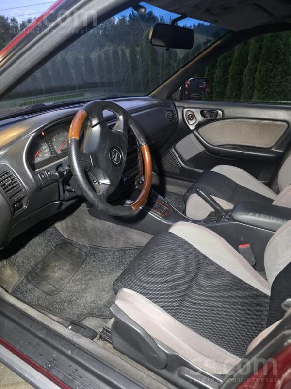 Sarkans Subaru Outback 1998 Rīga, ar dzinēja tilpumu 2.50 L un nobraukumu 280 tūkst. km par 6500 €, foto 6 vietnē AUTOMOTO.COM.LV