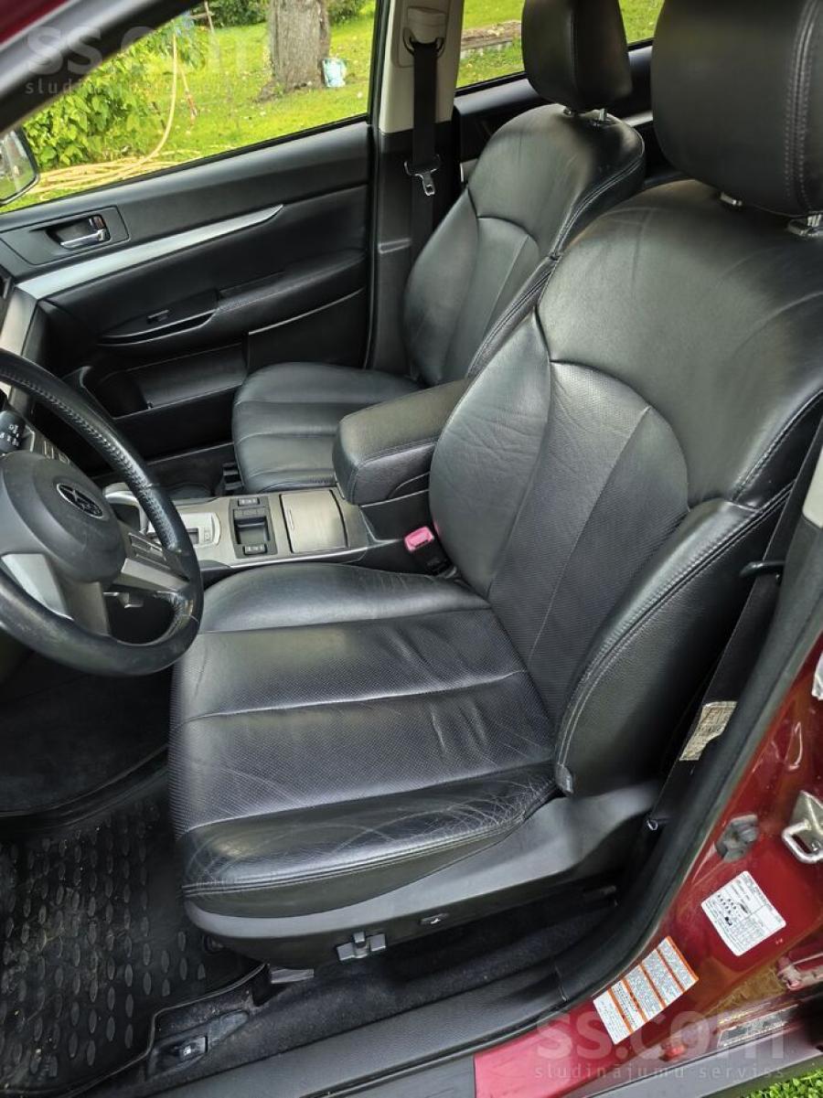 Red Subaru Outback 2010 in Riga, with an engine capacity of 2.50 L and mileage of 263 thousand km for 5900 €, photo 8 on AUTOMOTO.COM.LV