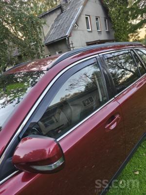 Red Subaru Outback 2010 in Riga, with an engine capacity of 2.50 L and mileage of 263 thousand km for 5900 €, photo 11 on AUTOMOTO.COM.LV