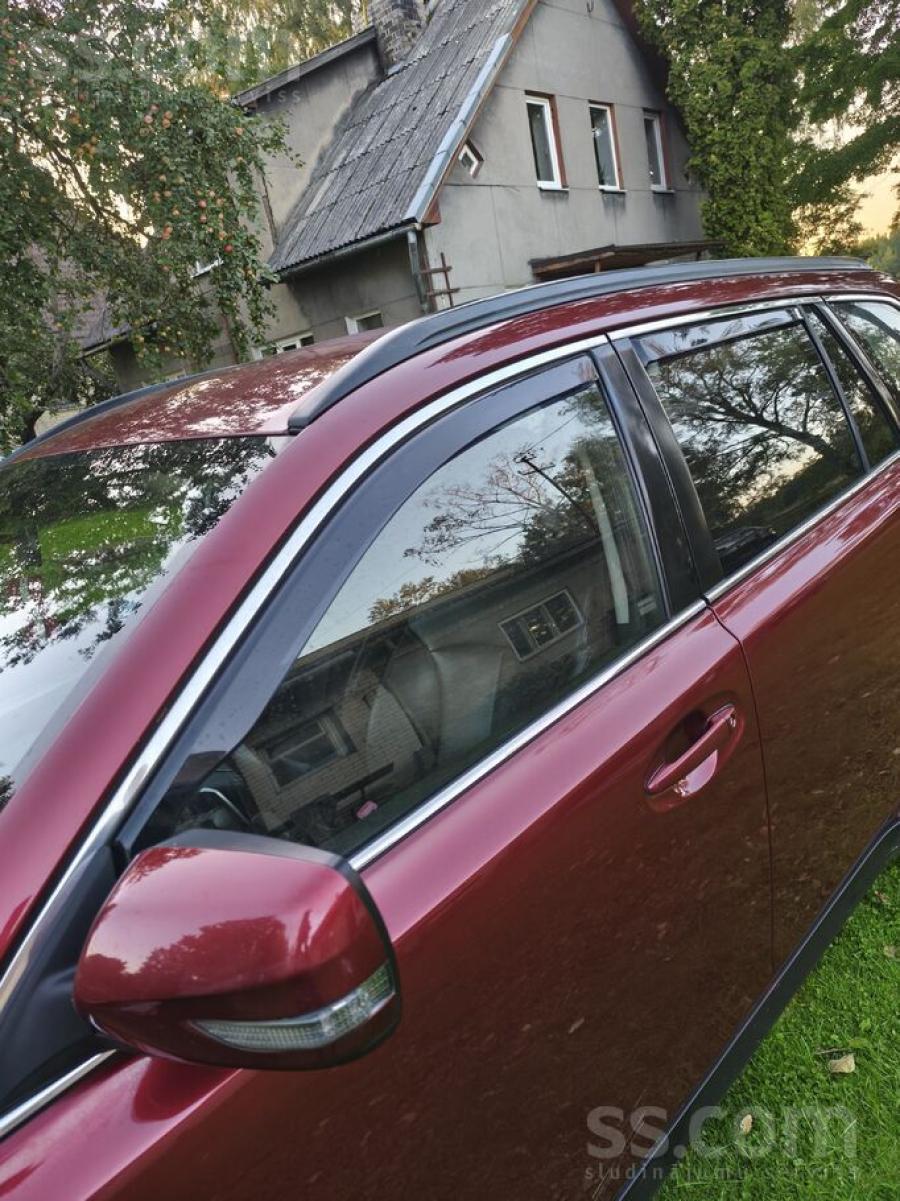 Red Subaru Outback 2010 in Riga, with an engine capacity of 2.50 L and mileage of 263 thousand km for 5900 €, photo 11 on AUTOMOTO.COM.LV