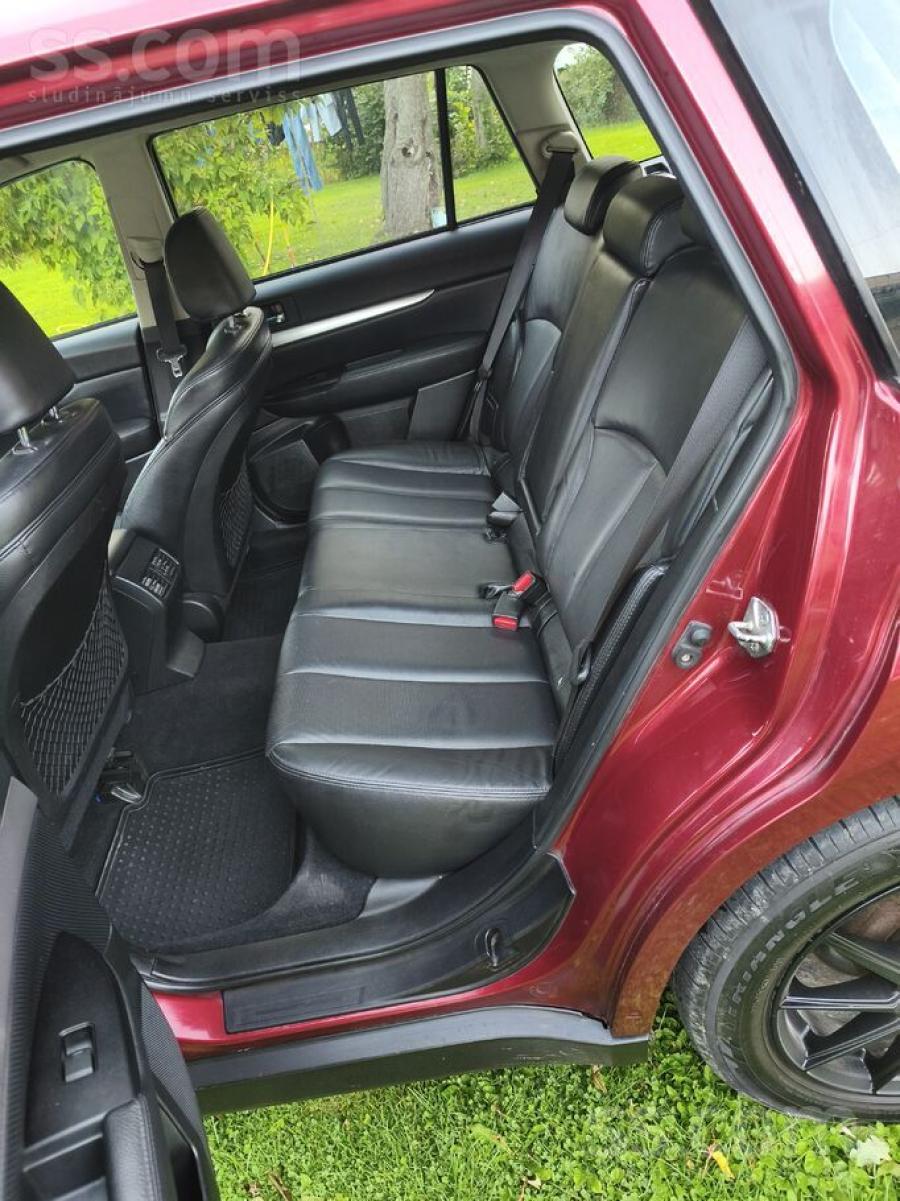 Red Subaru Outback 2010 in Riga, with an engine capacity of 2.50 L and mileage of 263 thousand km for 5900 €, photo 12 on AUTOMOTO.COM.LV