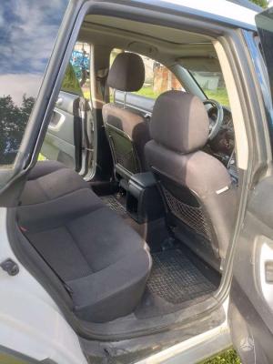 White Subaru Outback 2007 in Skuodas, with an engine capacity of 2.50 L and mileage of 410 thousand km for 2400 €, photo 8 on AUTOMOTO.COM.LV