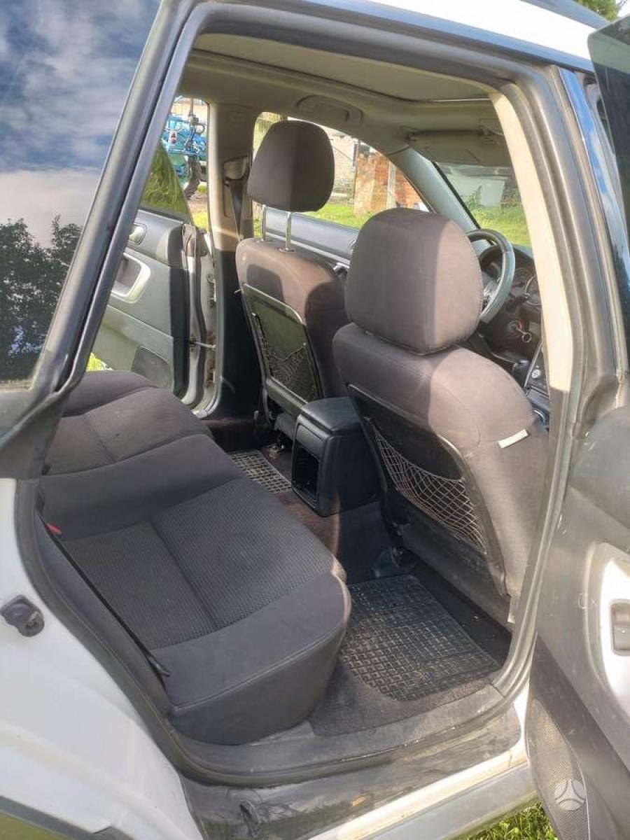 White Subaru Outback 2007 in Skuodas, with an engine capacity of 2.50 L and mileage of 410 thousand km for 2400 €, photo 8 on AUTOMOTO.COM.LV