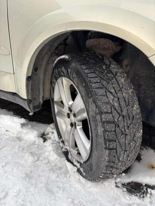 Yellow Subaru Outback 2005 in Siauliai, with an engine capacity of 3.00 L and mileage of 237 thousand km for 3950 €, photo 7 on AUTOMOTO.COM.LV