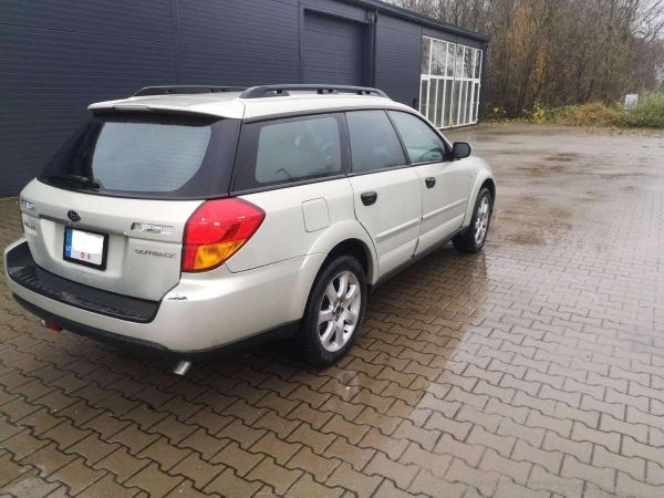 Yellow Subaru Outback 2006 in Kaunas, with an engine capacity of 2.46 L and mileage of 264 thousand km for 1799 €, photo 3 on AUTOMOTO.COM.LV