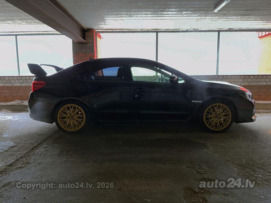 Black Subaru wrx-sti 2014 in Tallinn, with an engine capacity of 2.50 L and mileage of 126 thousand km for 26000 €, photo 4 on AUTOMOTO.COM.LV