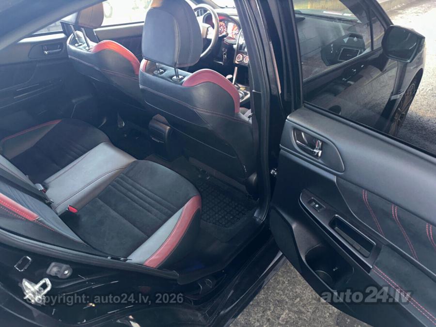 Black Subaru wrx-sti 2014 in Tallinn, with an engine capacity of 2.50 L and mileage of 126 thousand km for 26000 €, photo 24 on AUTOMOTO.COM.LV