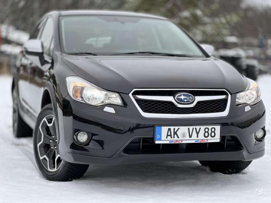 Black Subaru XV 2012 in Utena, with an engine capacity of 2.00 L and mileage of 181 thousand km for 6299 €, photo 6 on AUTOMOTO.COM.LV