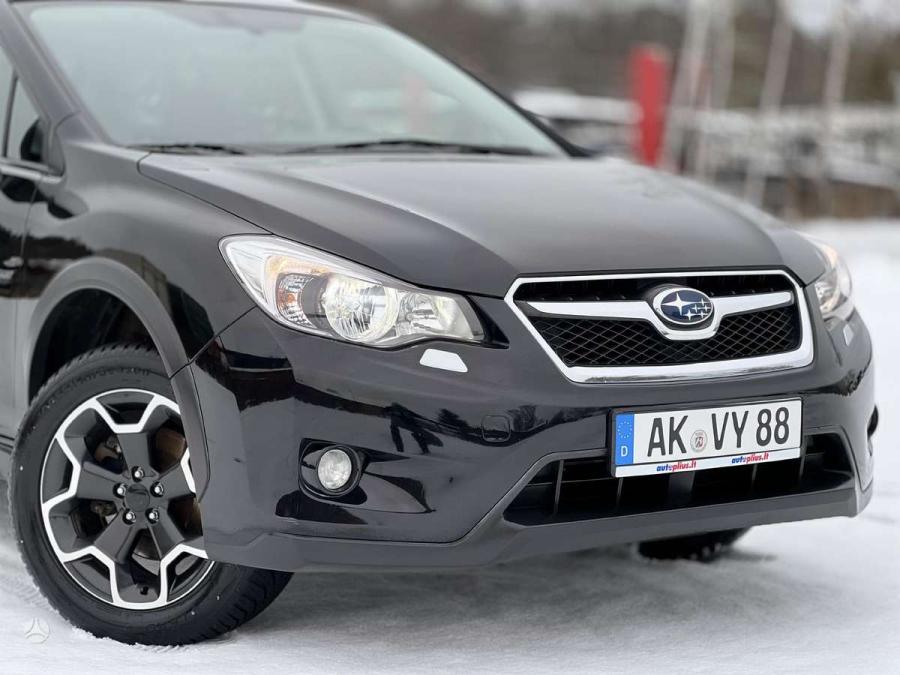 Black Subaru XV 2012 in Utena, with an engine capacity of 2.00 L and mileage of 181 thousand km for 6299 €, photo 7 on AUTOMOTO.COM.LV