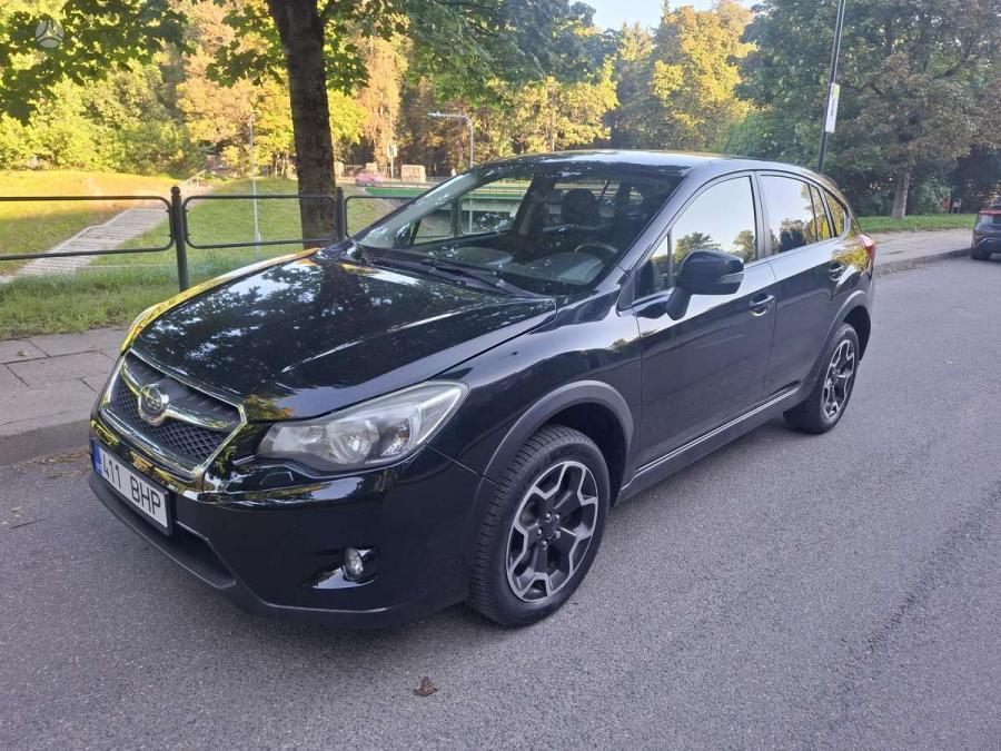 Black Subaru XV 2012 in Vilnius, with an engine capacity of 2.00 L and mileage of 192 thousand km for 6100 €, photo 1 on AUTOMOTO.COM.LV