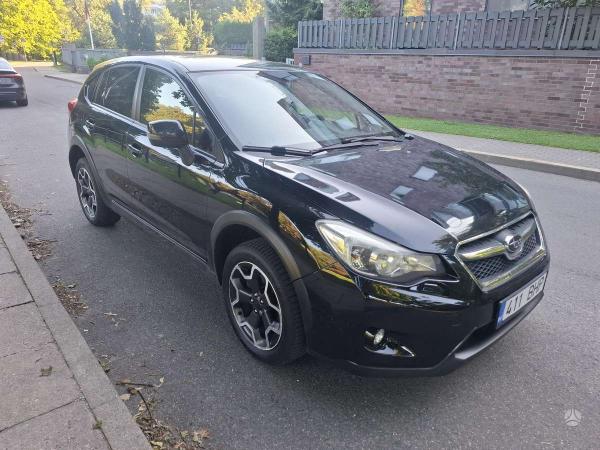 Black Subaru XV 2012 in Vilnius, with an engine capacity of 2.00 L and mileage of 192 thousand km for 6100 €, photo 4 on AUTOMOTO.COM.LV