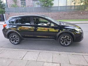 Black Subaru XV 2012 in Vilnius, with an engine capacity of 2.00 L and mileage of 192 thousand km for 6100 €, photo 5 on AUTOMOTO.COM.LV