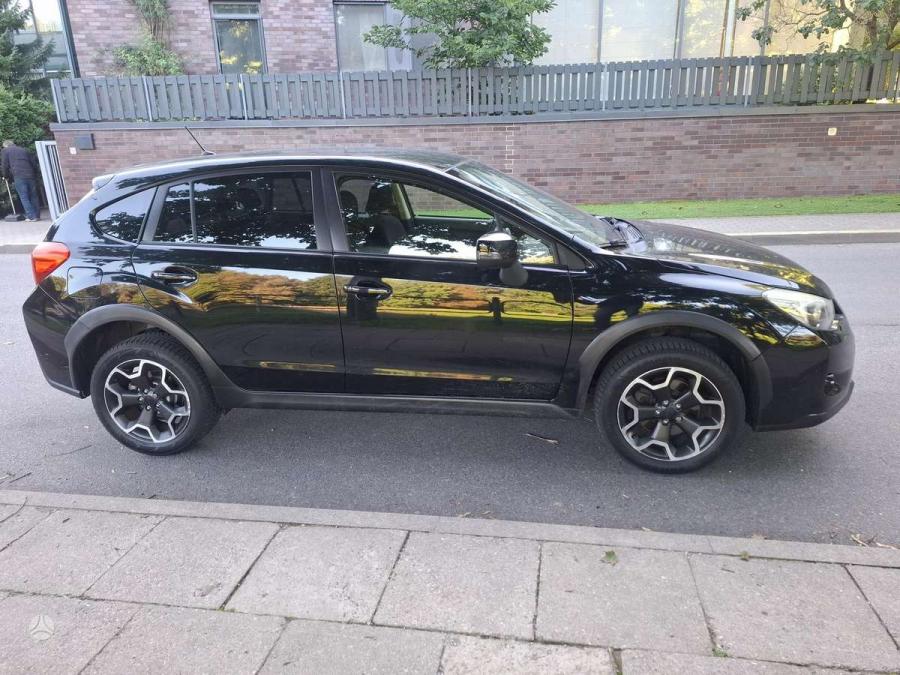 Black Subaru XV 2012 in Vilnius, with an engine capacity of 2.00 L and mileage of 192 thousand km for 6100 €, photo 5 on AUTOMOTO.COM.LV