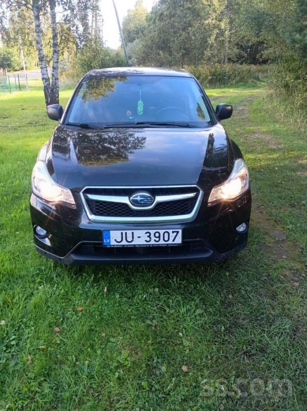 Black Subaru XV 2012 in Valmiera, with an engine capacity of 1.60 L and mileage of 192 thousand km for 6450 €, photo 1 on AUTOMOTO.COM.LV